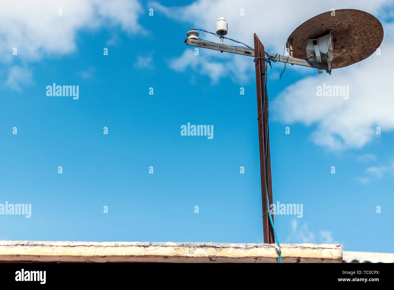 Telegraph pole under blue sky Stock Photo - Alamy