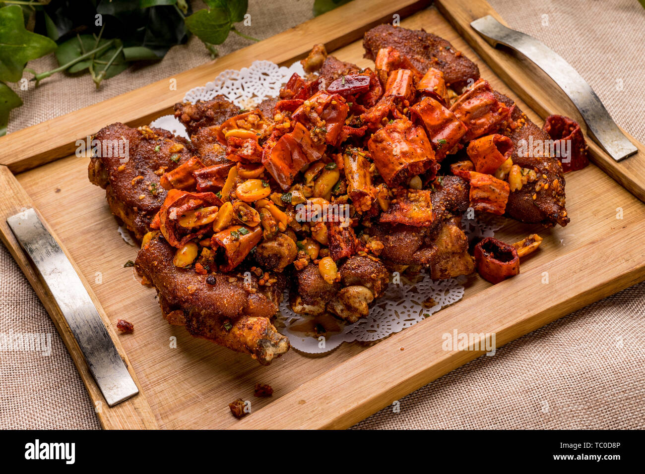 Crispy, spicy, roasted pig's feet Stock Photo - Alamy