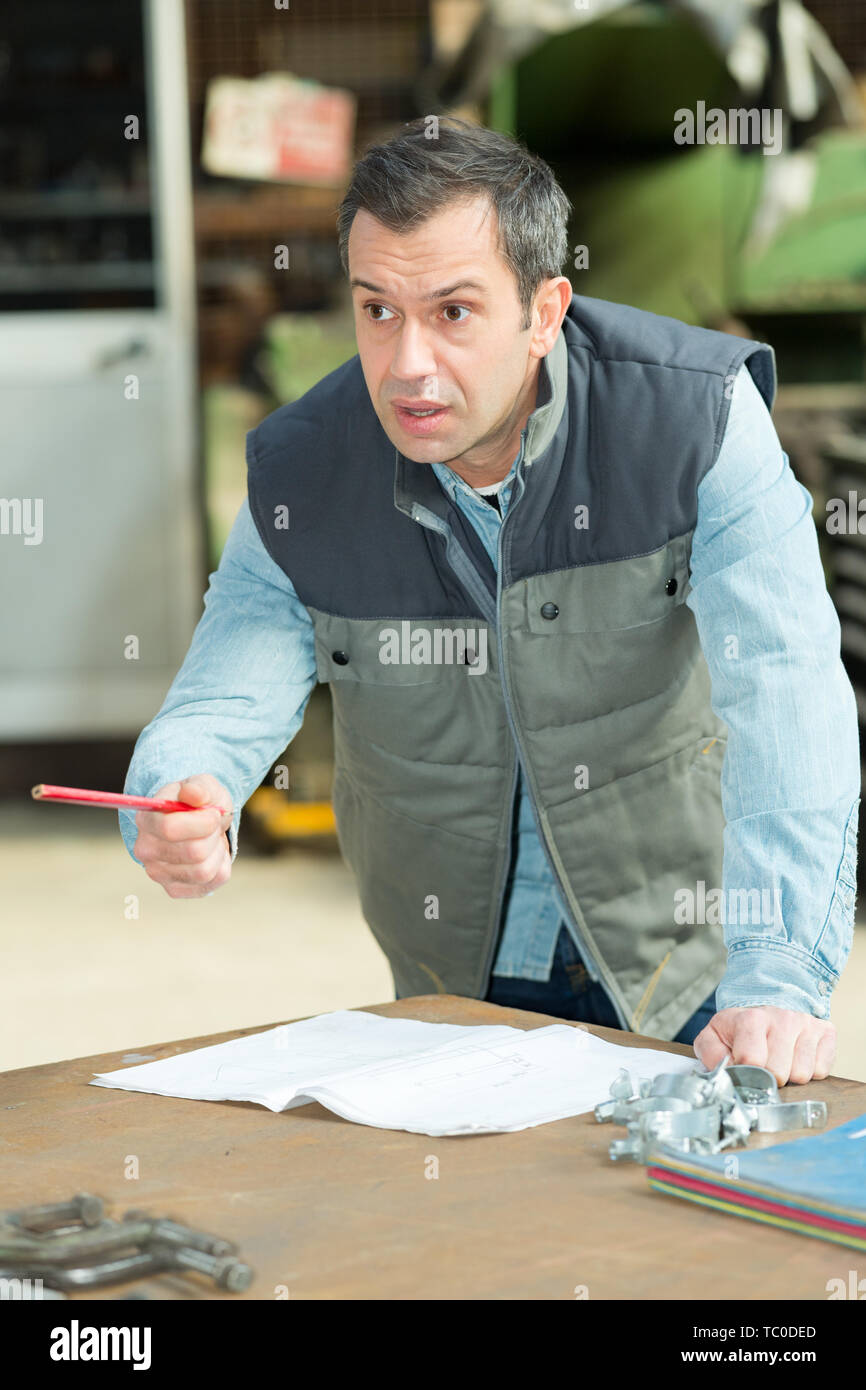 Concerned construction worker hi-res stock photography and images - Alamy