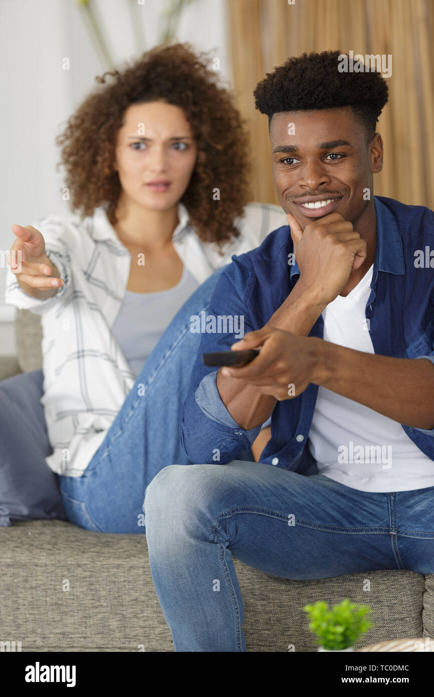 Upset woman husband watching tv hi-res stock photography and images - Alamy