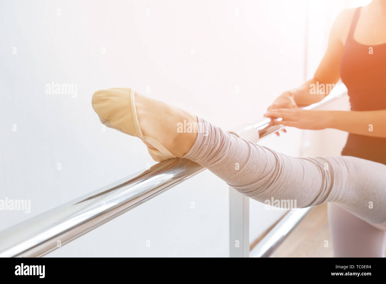 The woman in the dance hall at the ballet machine Stock Photo - Alamy