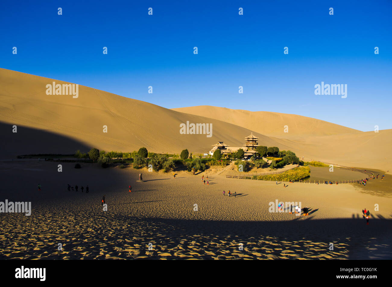 Crescent Spring in Mingsha Mountain, Dunhuang, Gansu Province Stock ...