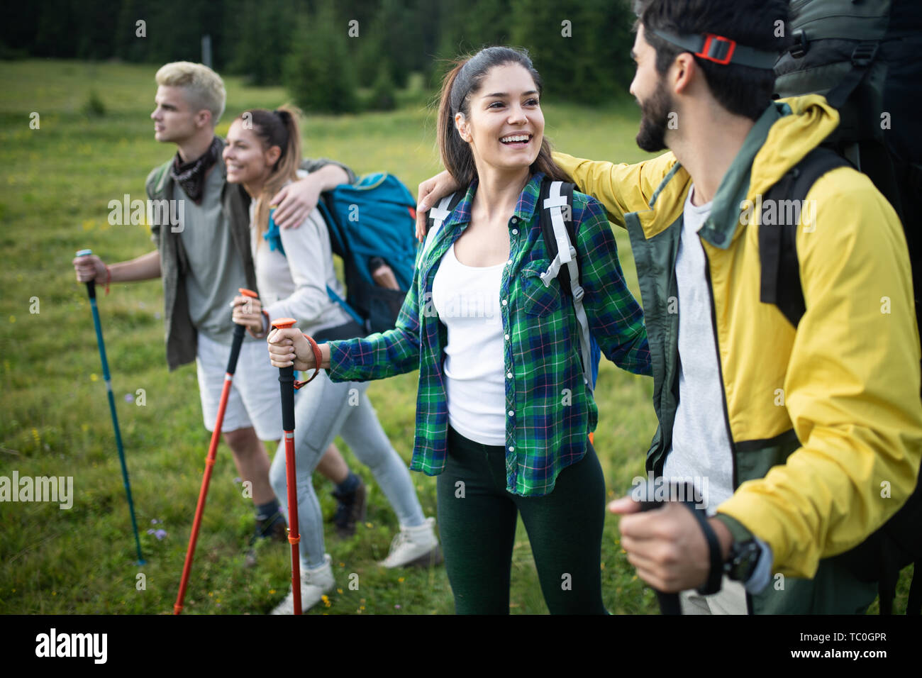 Adventure, travel, tourism, hike and people concept - group of smiling ...