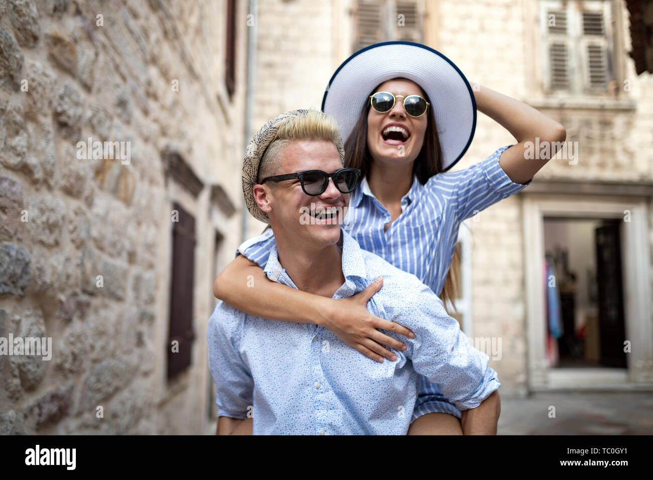 Happy loving couple. Happy young man piggybacking his girlfriend Stock ... Happy loving couple. Happy young man piggybacking his girlfriend Stock ...