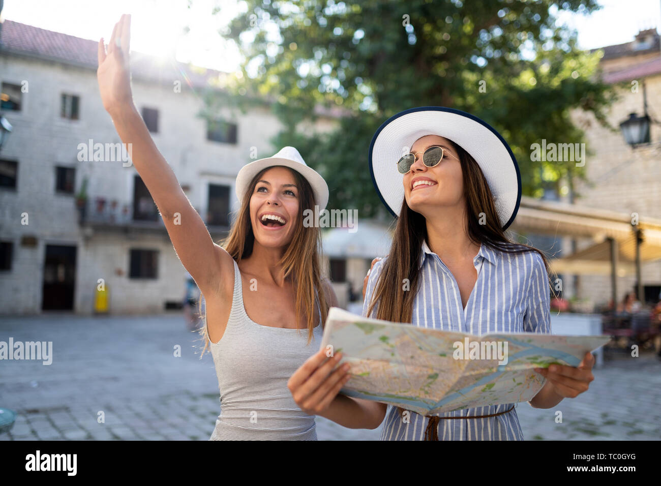 Girls Friendship Hangout Traveling Holiday Map Concept Stock Photo - Alamy