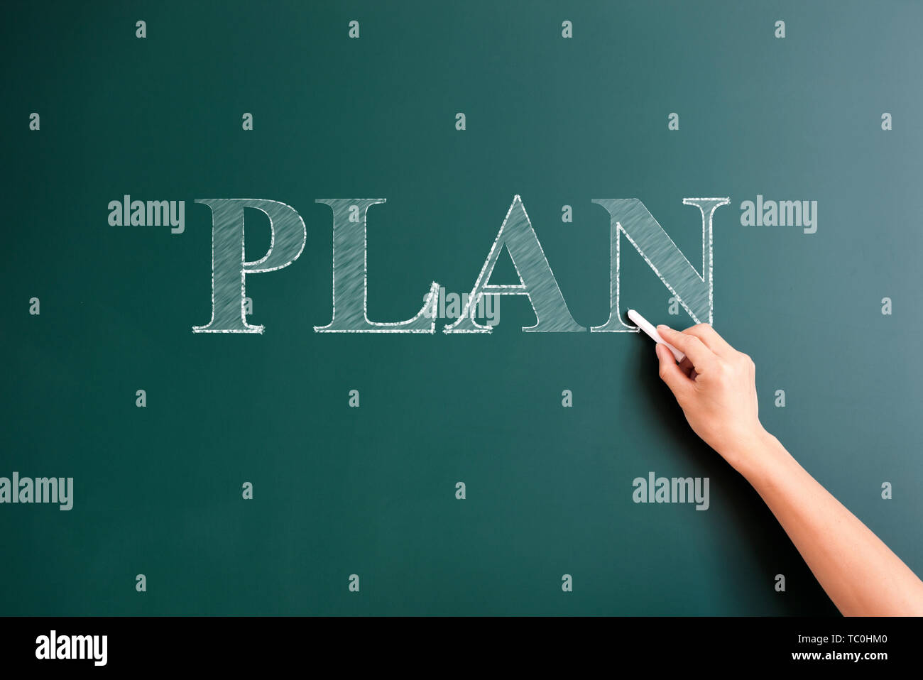 Plan written on blackboard Stock Photo - Alamy