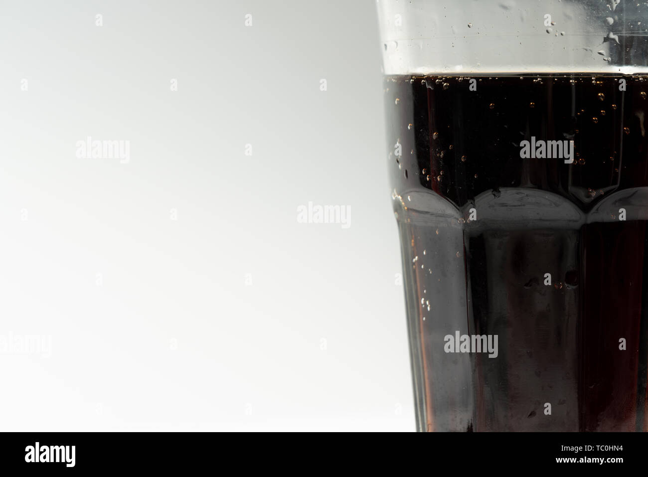 Coke in front of white background Stock Photo - Alamy