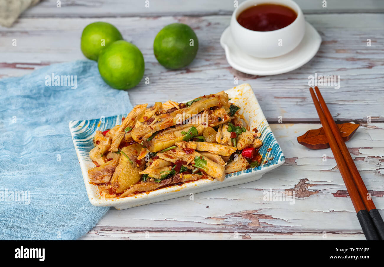 drooling chicken, stick chicken Stock Photo - Alamy