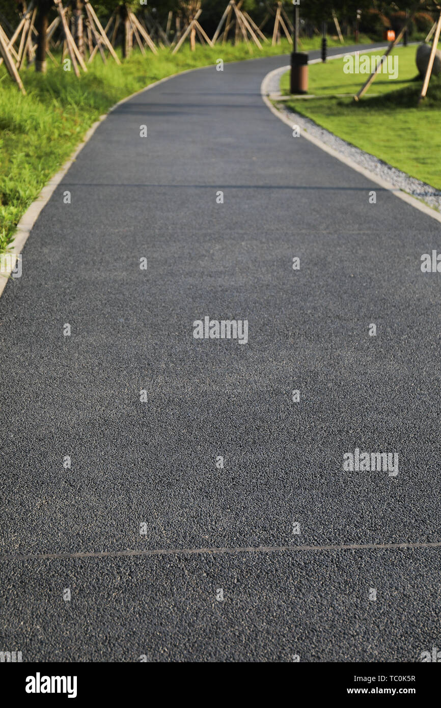 Pavement, cement road, park, path Stock Photo - Alamy