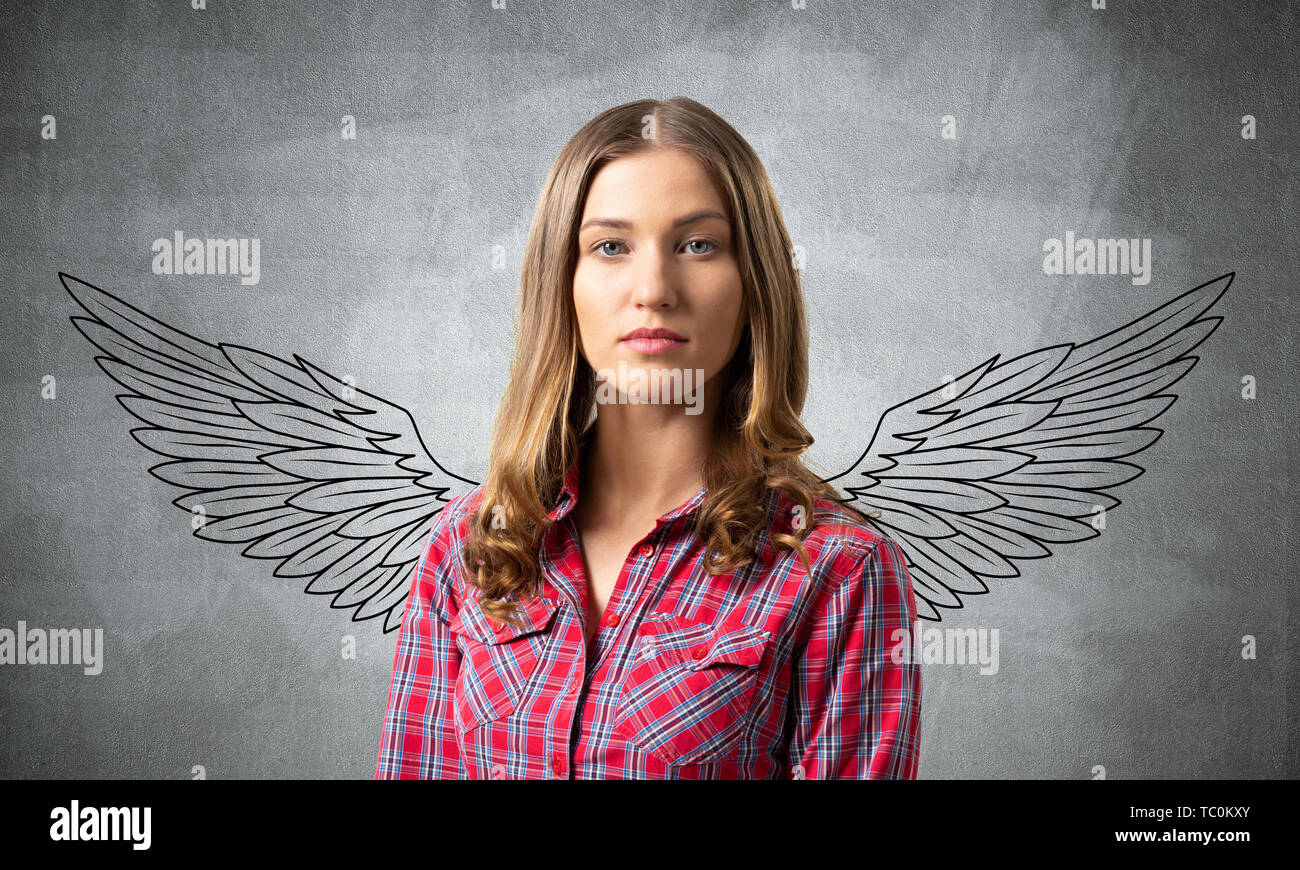 Young woman having serious and calm face Stock Photo - Alamy