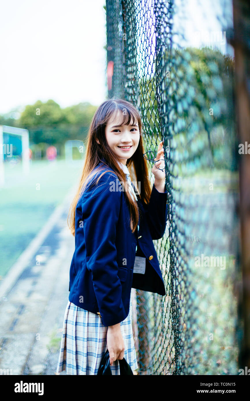 Girl playground uniform hi-res stock photography and images - Alamy
