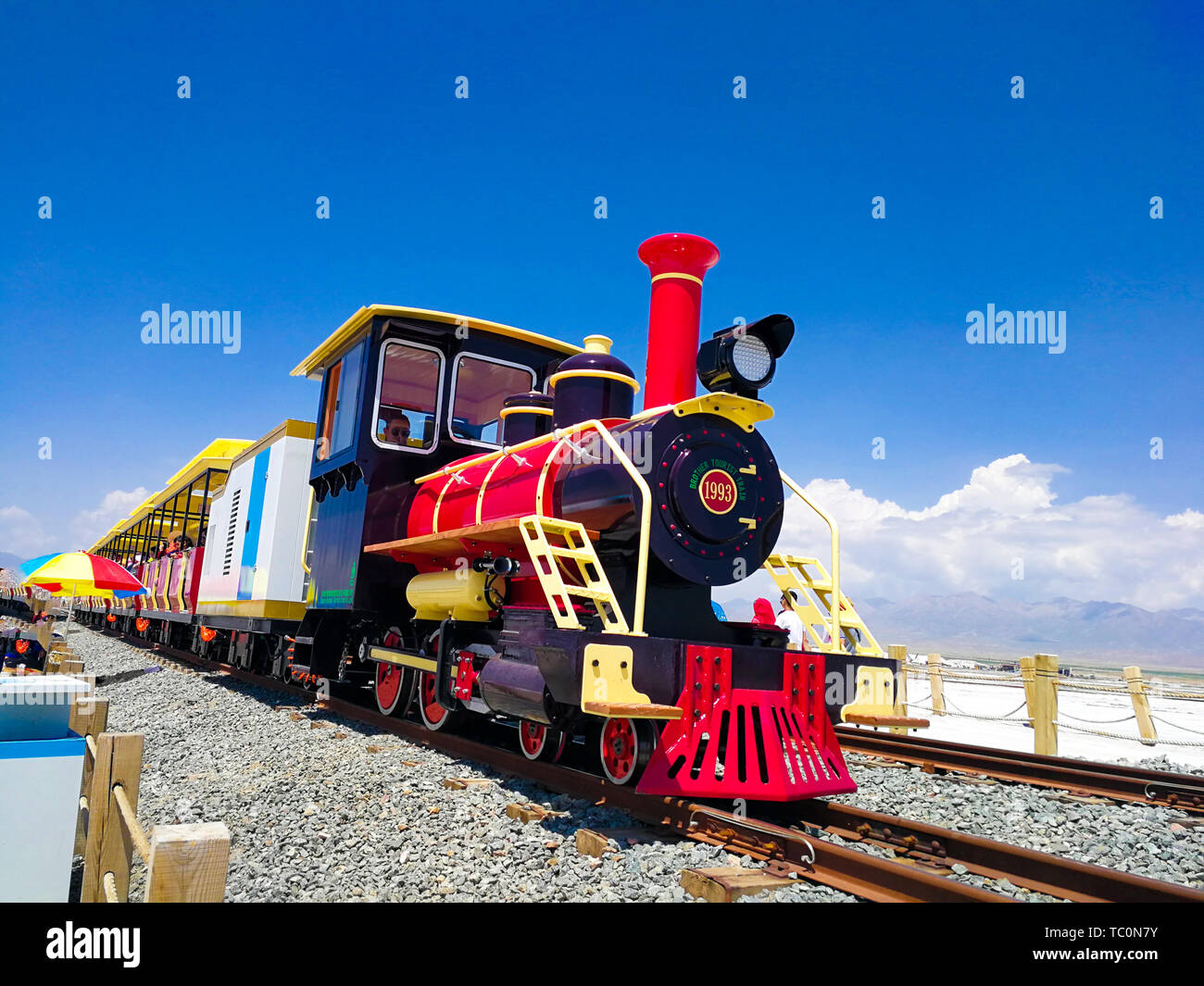 Small train in Chaka Salt Lake, Qinghai Stock Photo - Alamy