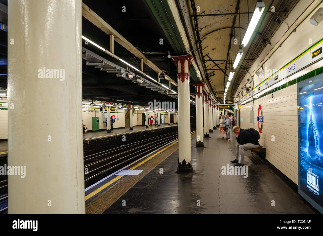 Man sits bench subway station hi-res stock photography and images - Alamy