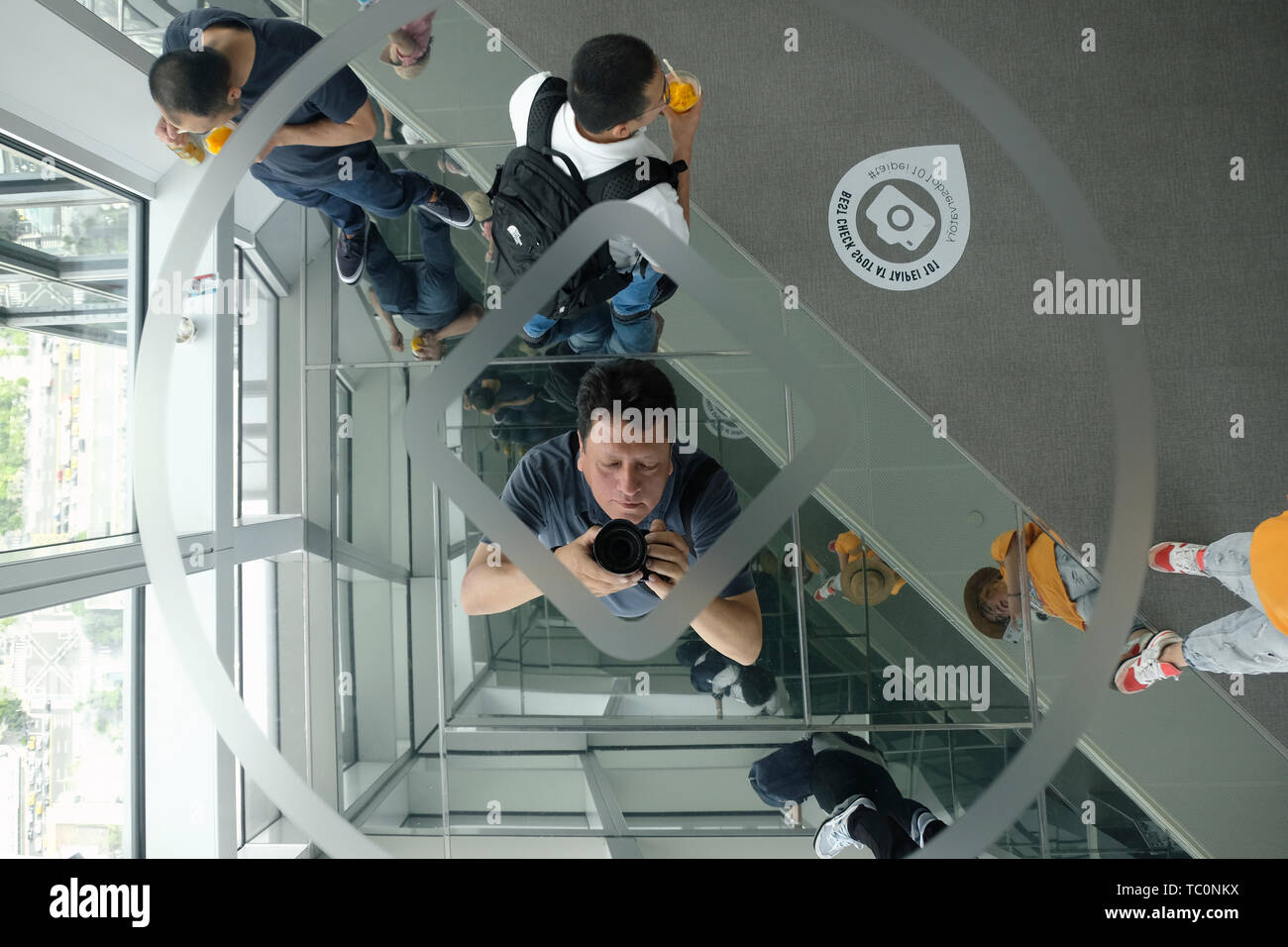 Visitors on the top floor of the Taipei 101 a landmark supertall ...