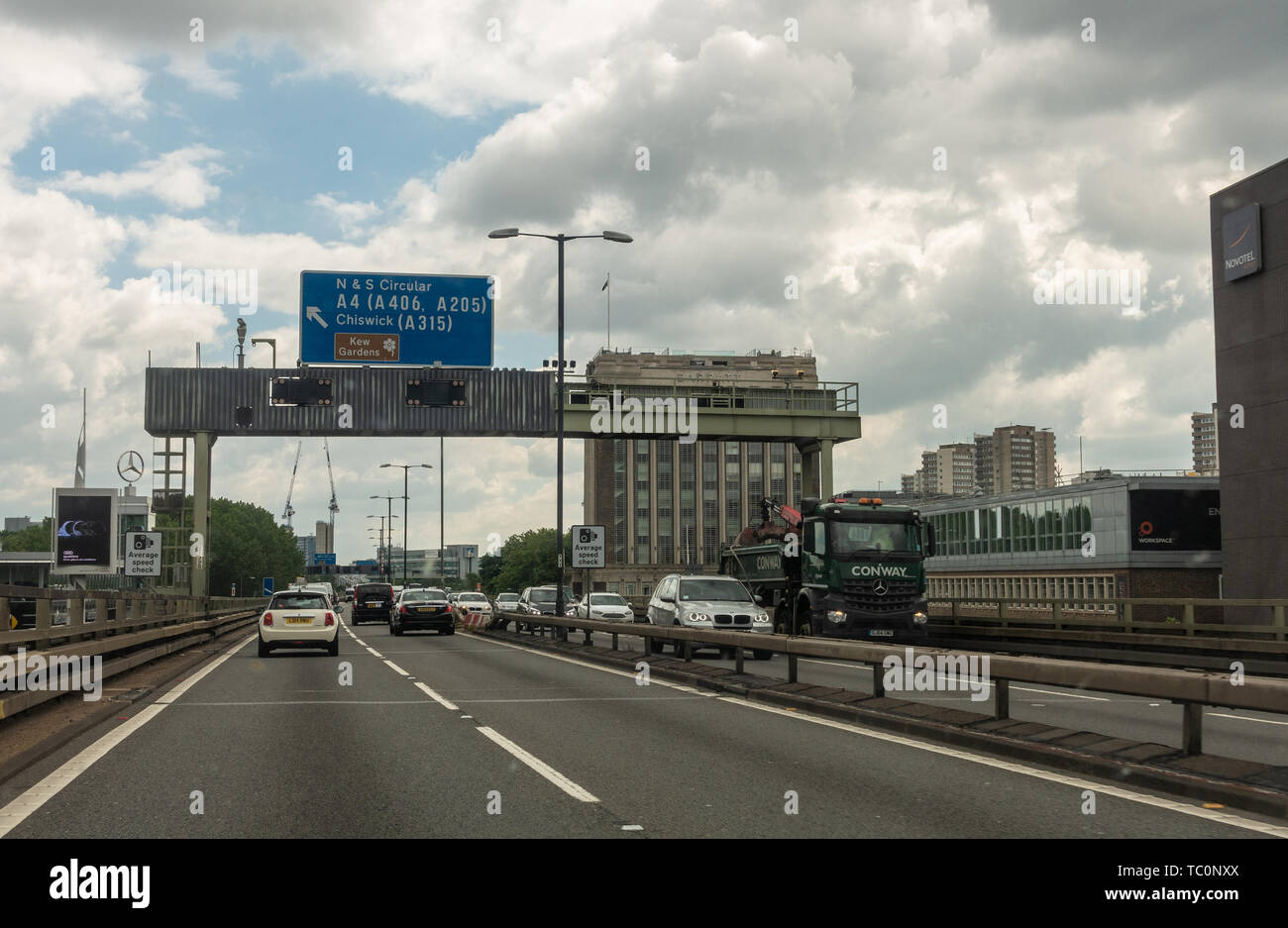 Driving into London on the M4 motorway on a cloudy day, entering the ...