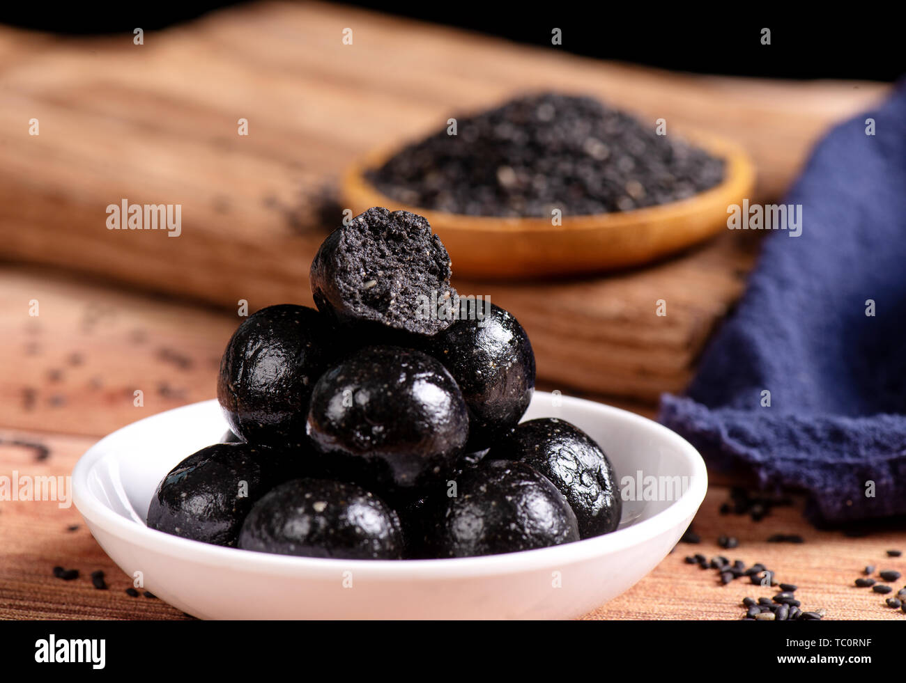 Black sesame pill Stock Photo - Alamy