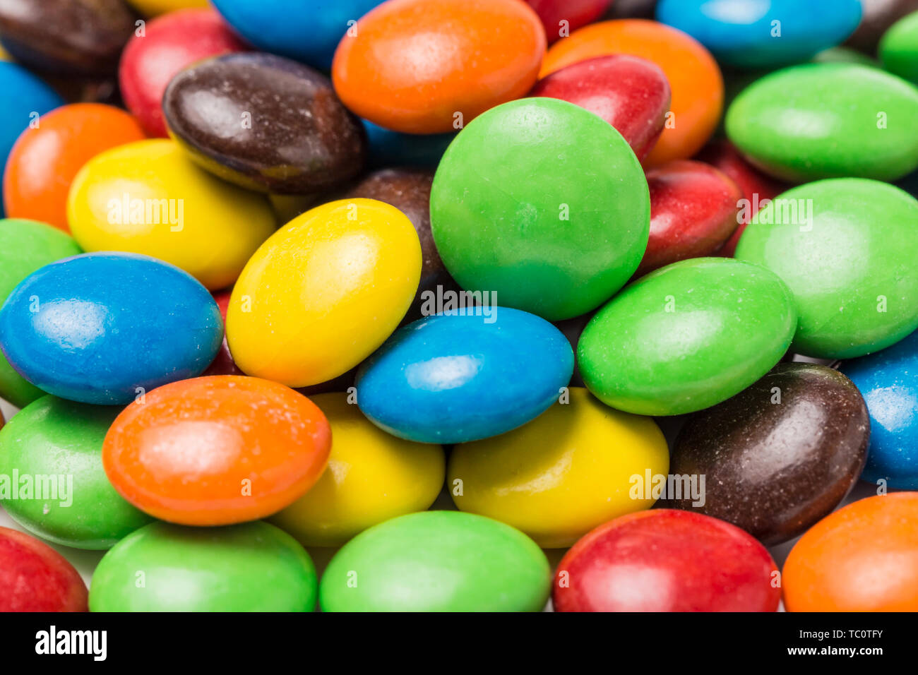 Colored chocolate beans Stock Photo - Alamy