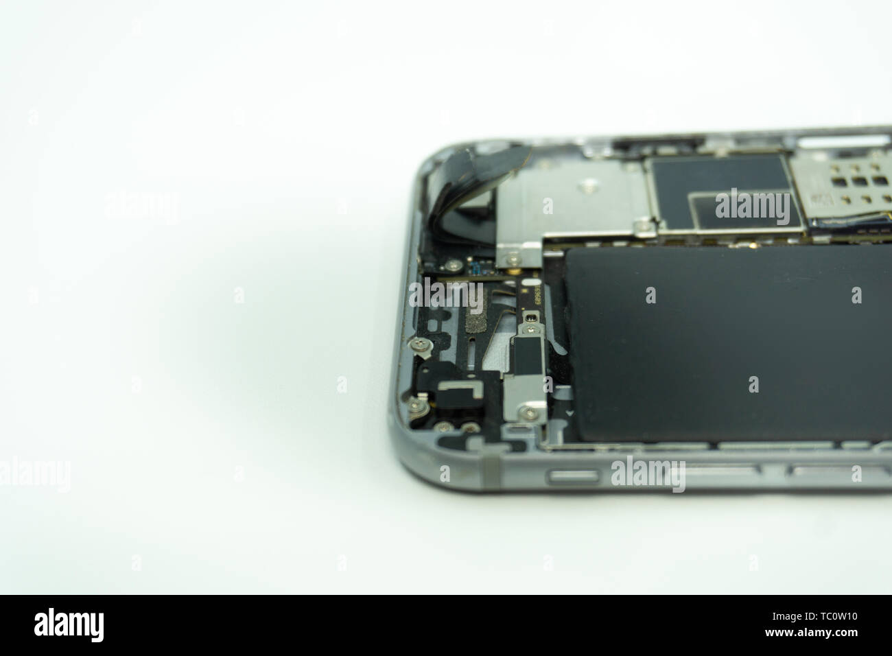 Photo of a mobile phone with broken display. Isolated on white with ...