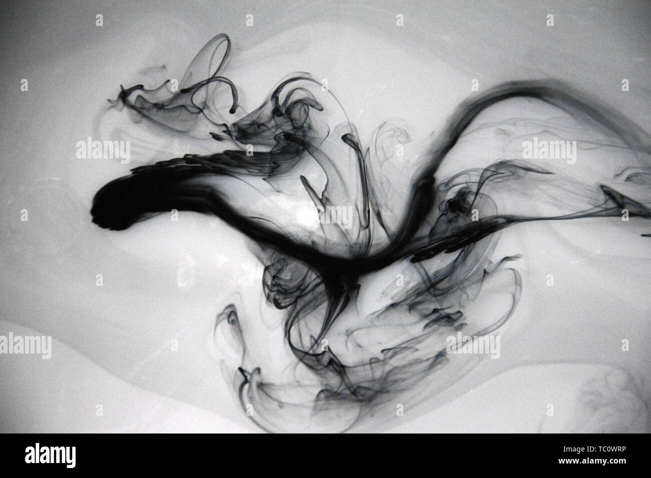 Ink background, ink flowing in water Stock Photo - Alamy