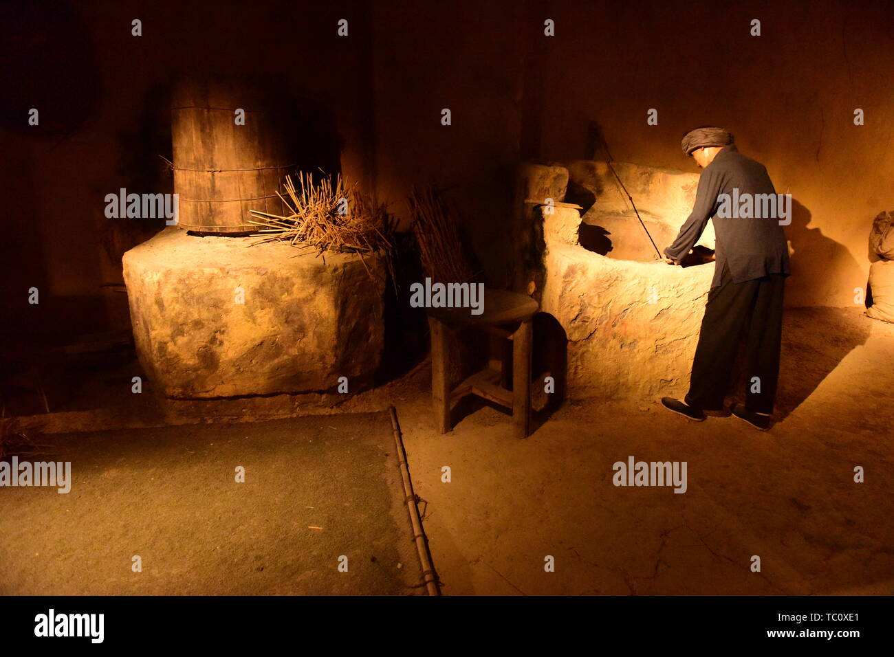 The ancient method of extracting oil Stock Photo - Alamy