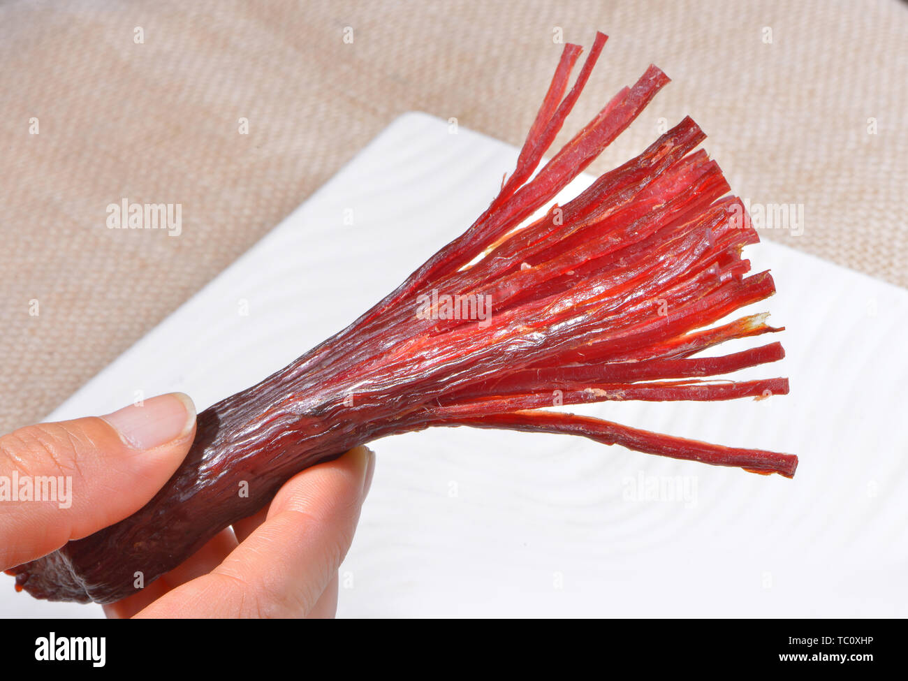 Hand torn beef hi-res stock photography and images - Alamy
