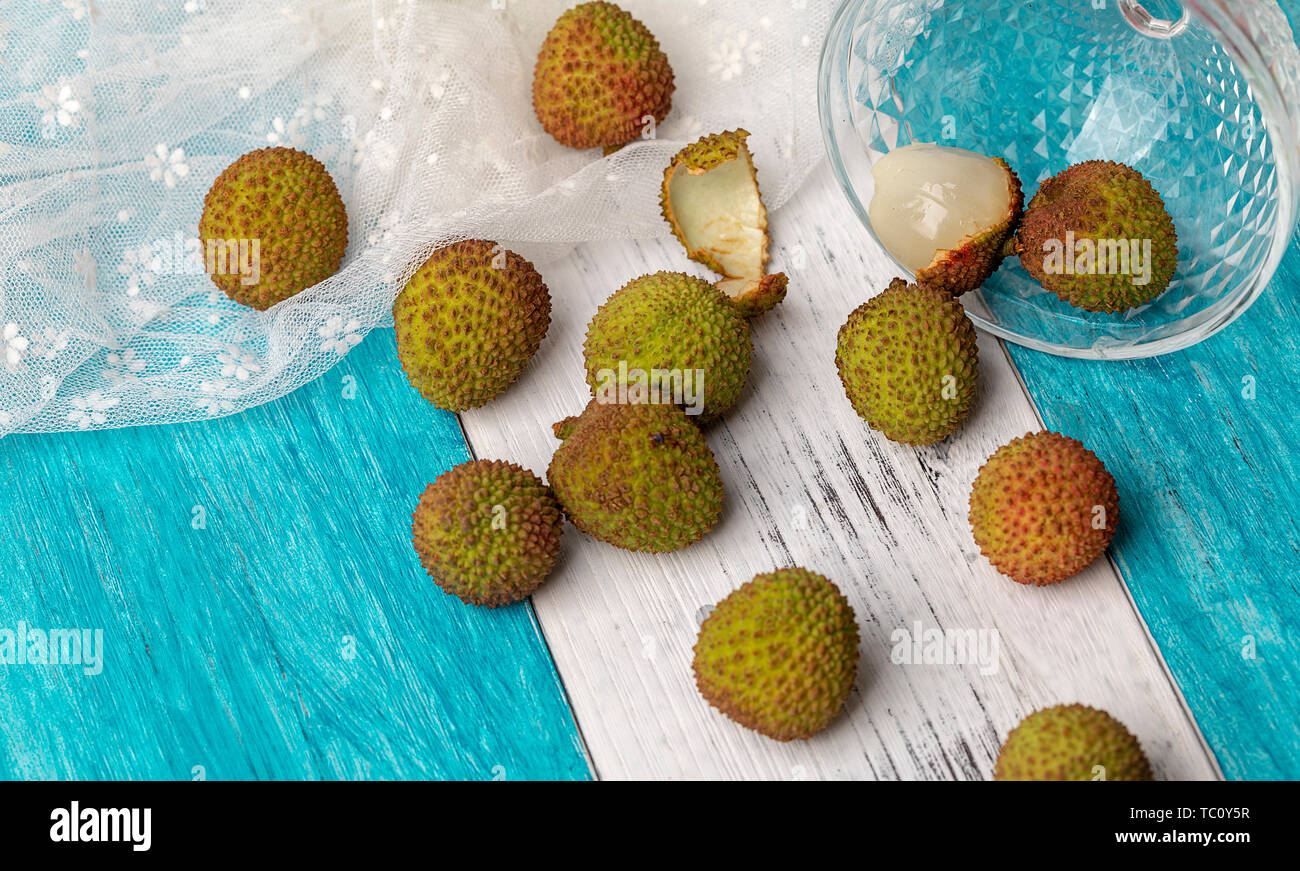 Fresh lychee on the table Stock Photo - Alamy