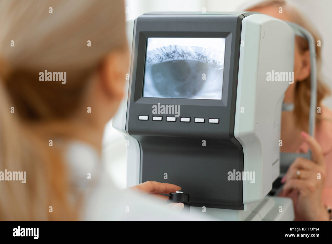 Using computer technologies. Attentive professional therapist observing ...