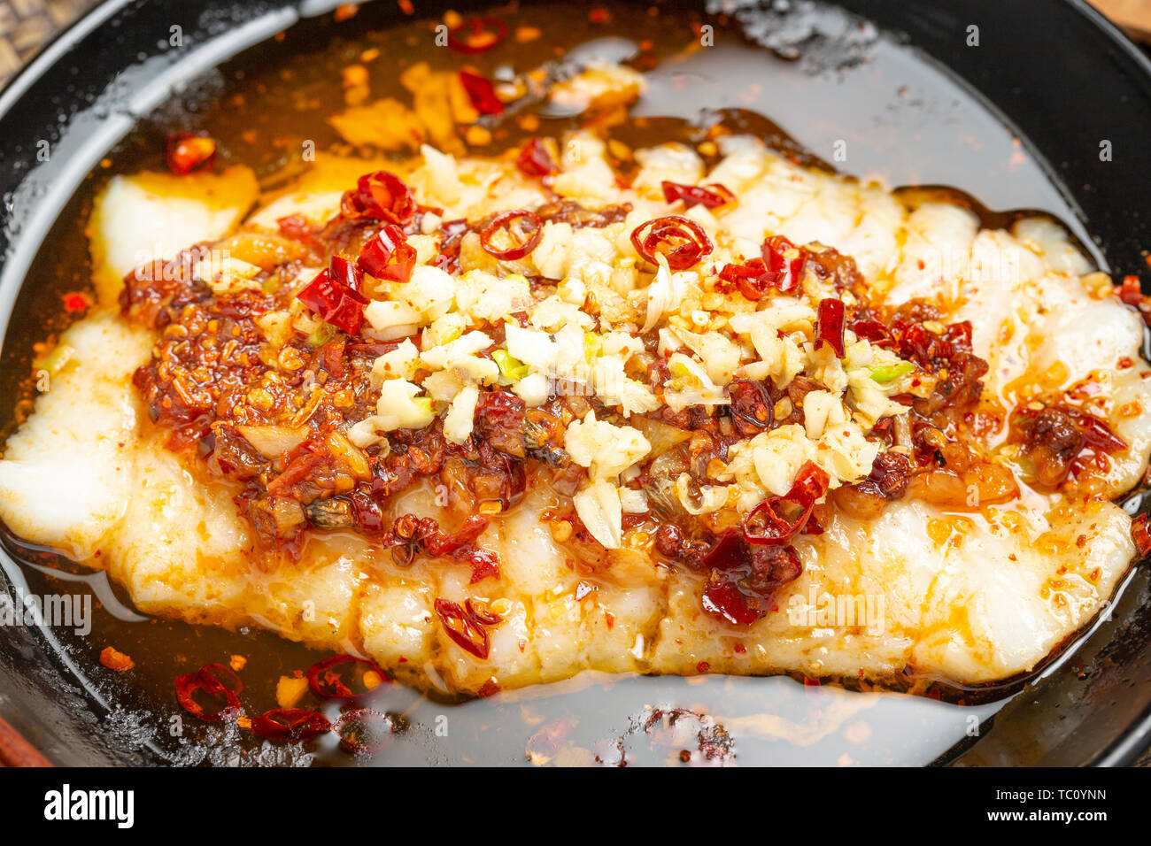 Spicy boiled fish Stock Photo - Alamy