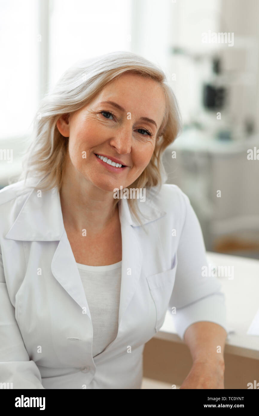 Woman wearing white robe working hi-res stock photography and images ...