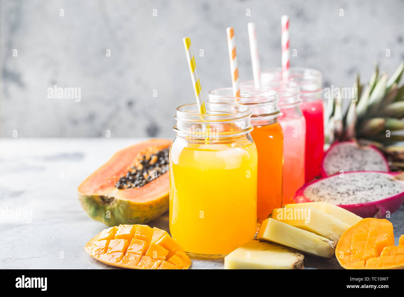 Glasses of tropical juices Stock Photo - Alamy