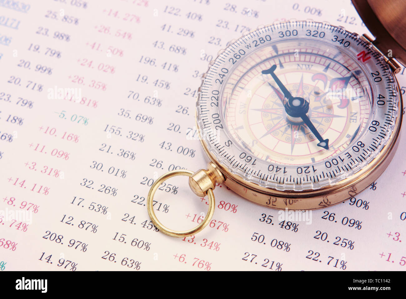 Data and compass Stock Photo - Alamy