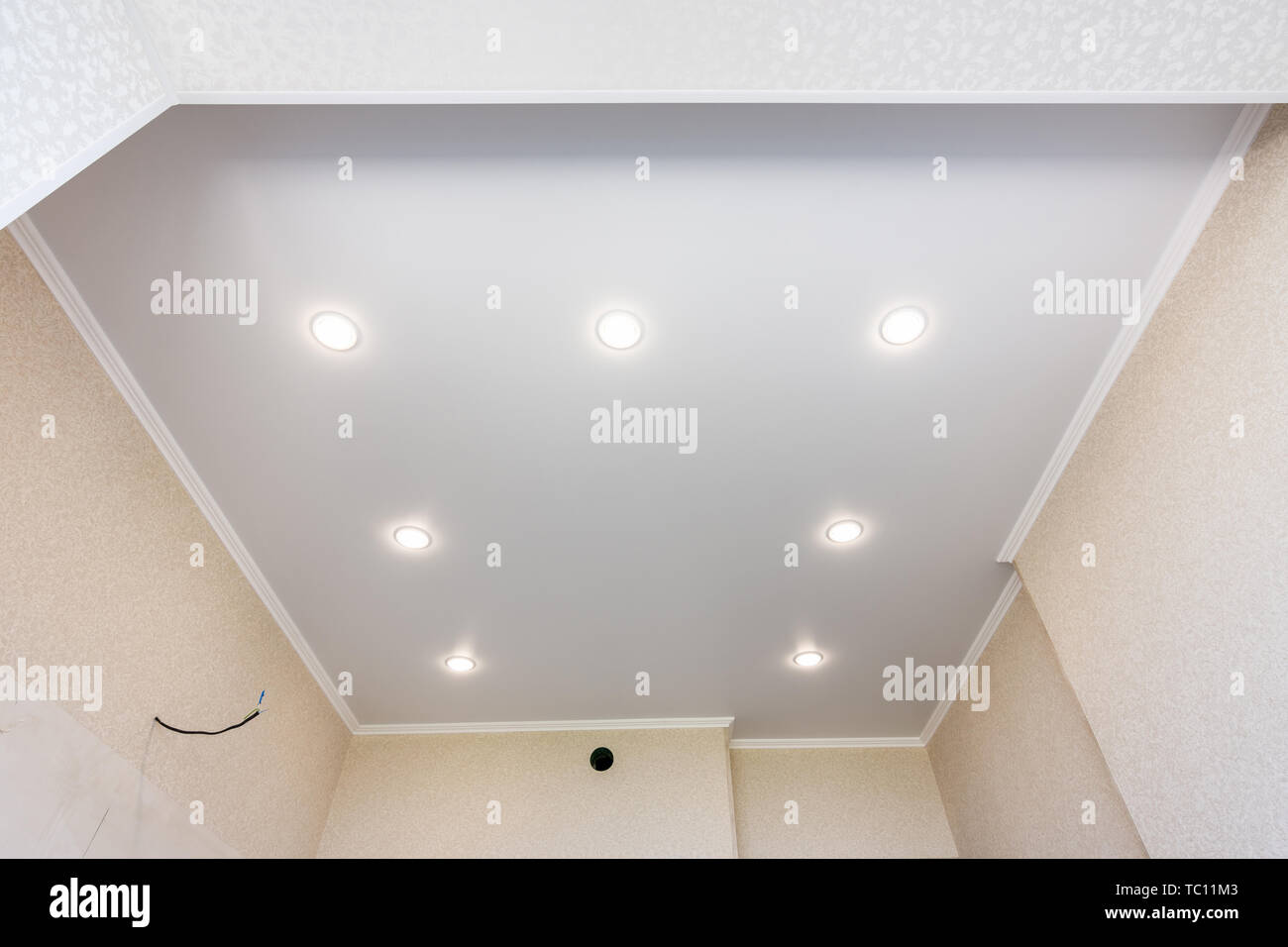 Stretch ceiling in the kitchen with installed and included spotlights ...