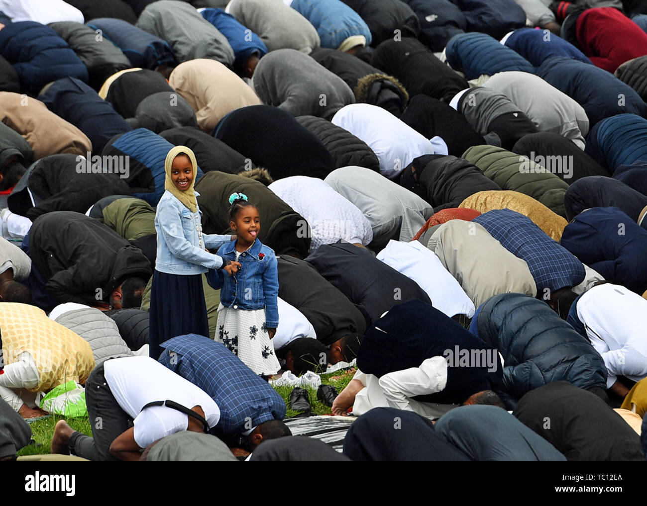 Two young worshippers enjoying eid celebrations hi-res stock ...