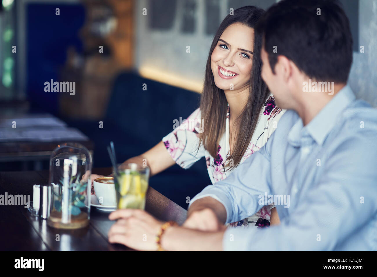 Picture of romantic couple dating in pub Stock Photo - Alamy