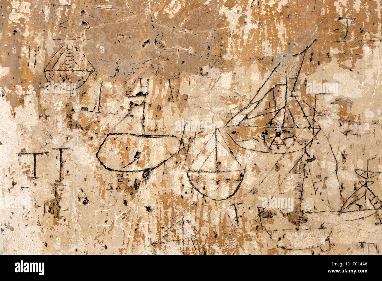 Scratched pictures of boats sailing ships on wall in church at Tunstall ...