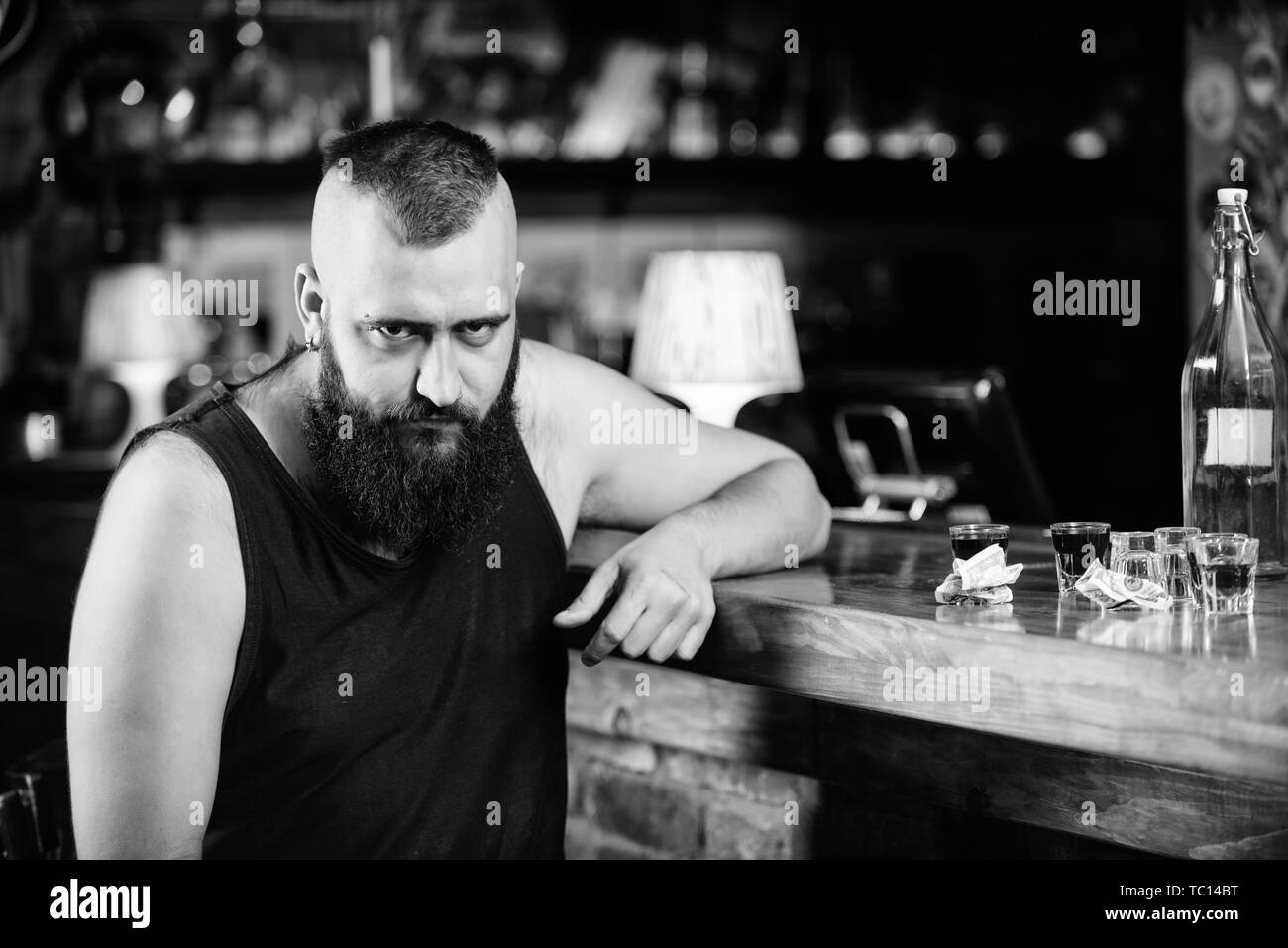 Guy spend leisure in bar with alcohol. Man drunk sit alone in pub ...