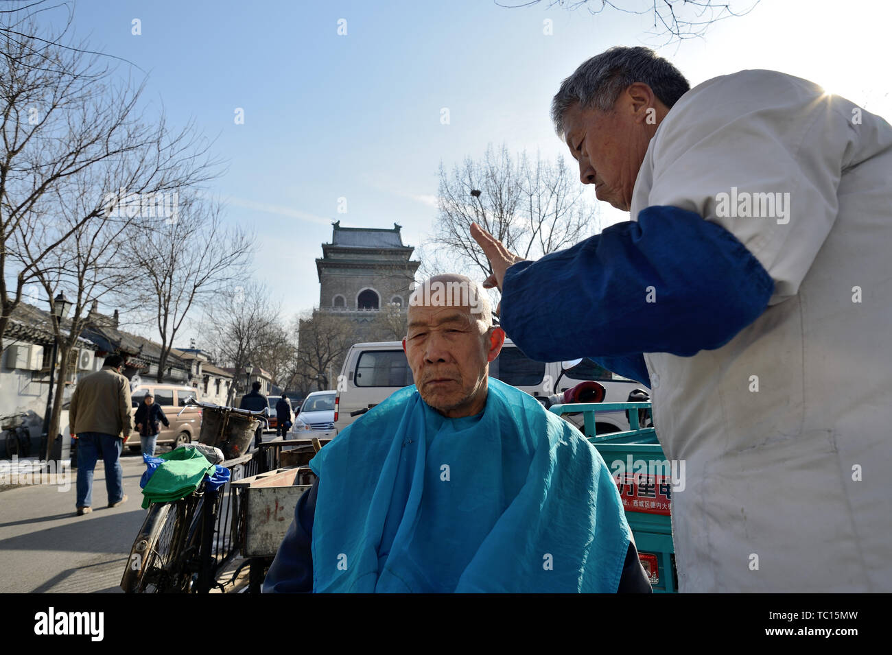 Pre-revamped clock tower square, head shaving stall Stock Photo - Alamy