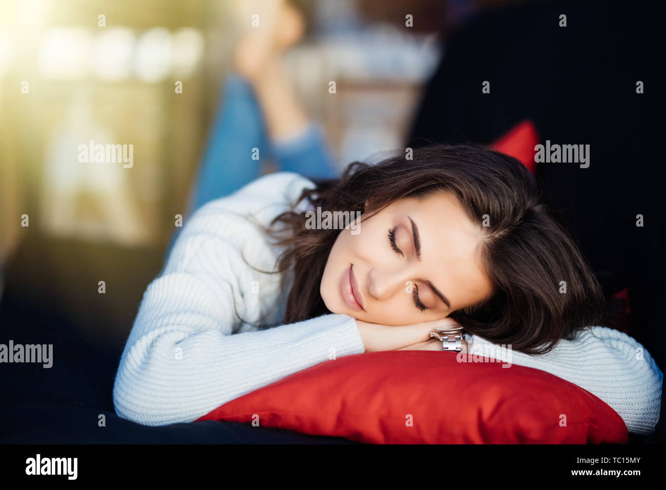 Woman taking a nap sofa hi-res stock photography and images - Alamy