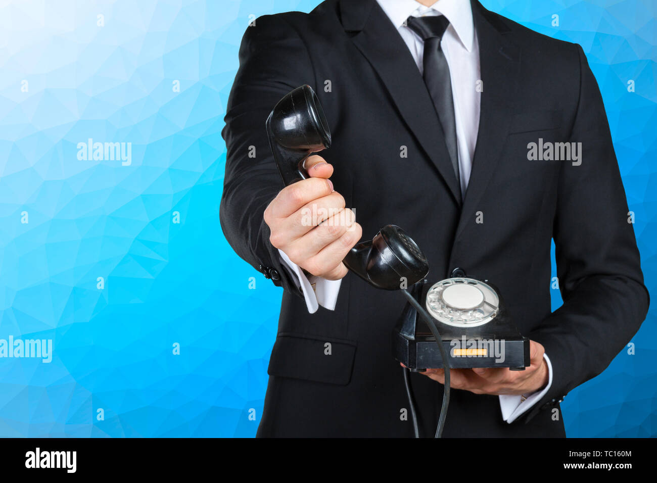Receptionist holding receiver hi-res stock photography and images - Alamy