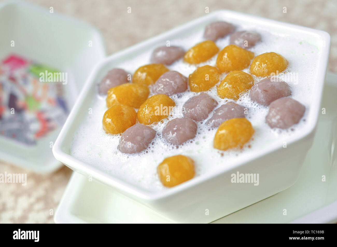 Fresh milk taro round desserts Stock Photo - Alamy