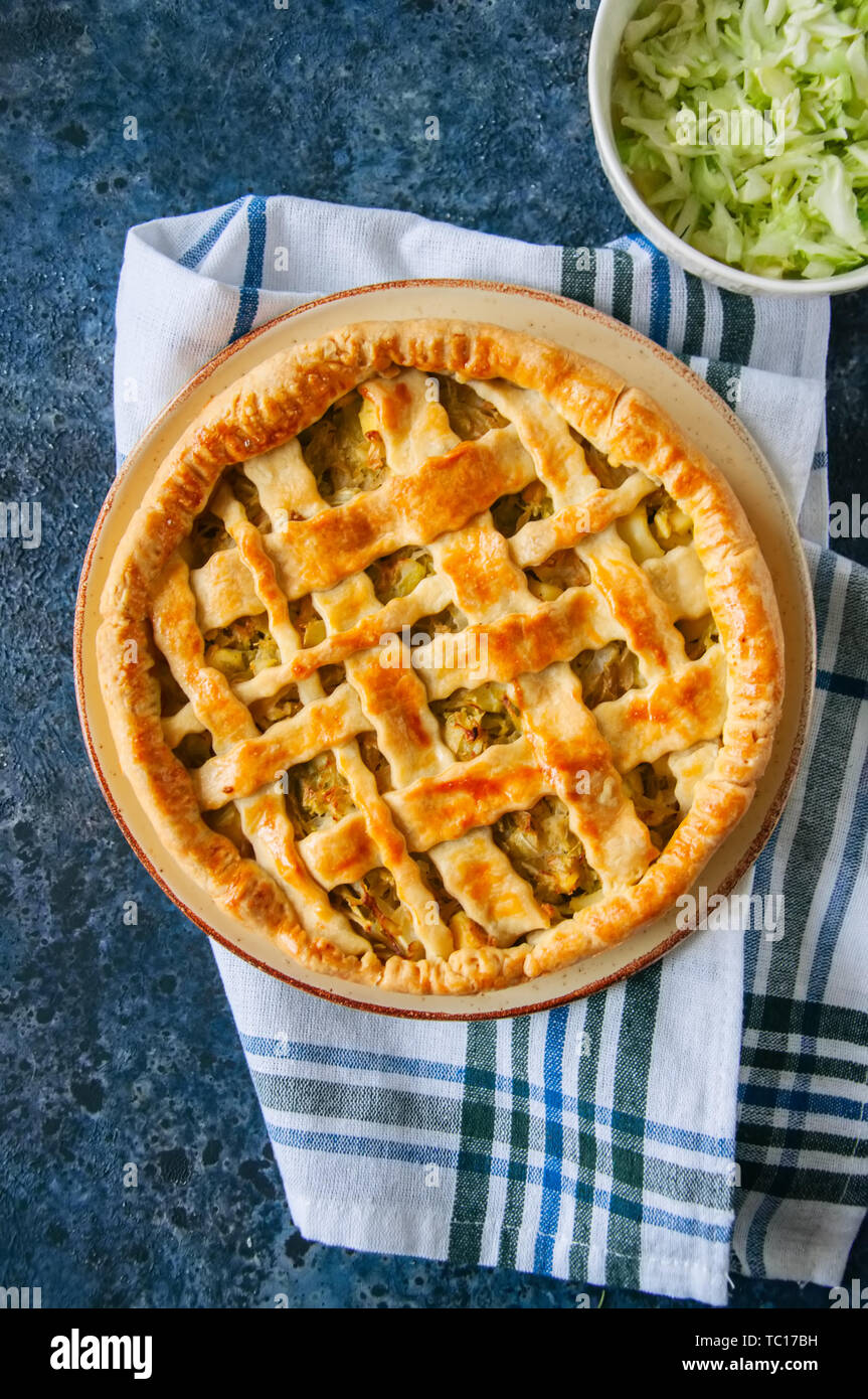 Top view of homemade young cabbage pie Stock Photo - Alamy