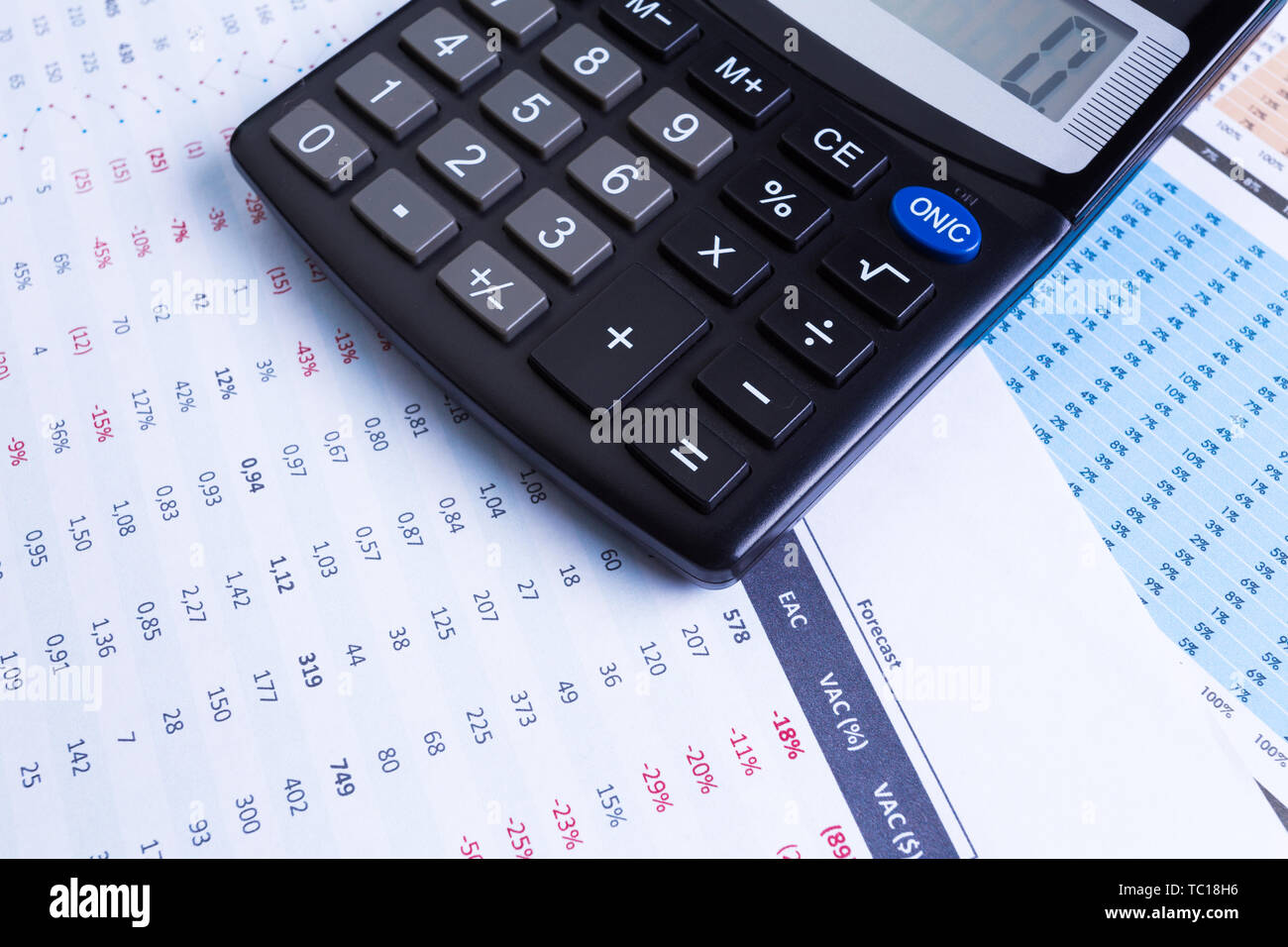 Graphs and Calculator Stock Photo - Alamy