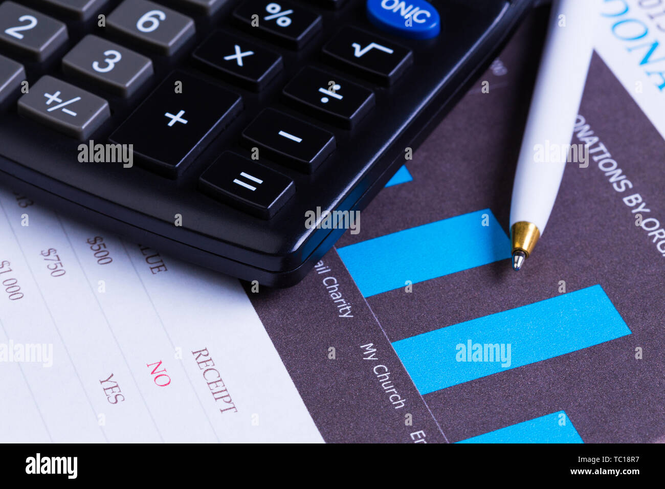 Graphs and Calculator Stock Photo - Alamy