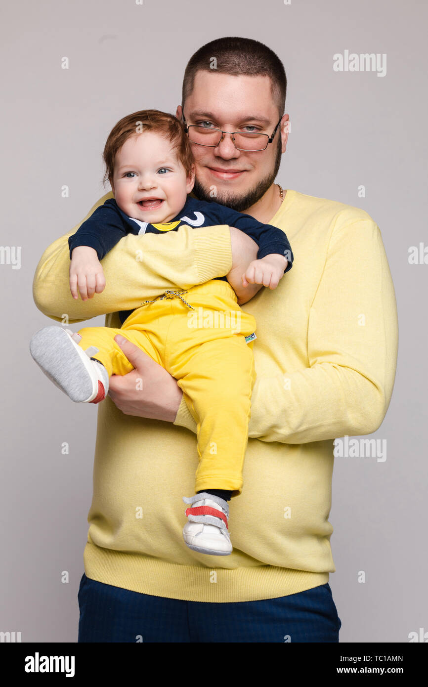 Portrait of happy father posing with lovely smiling child Stock Photo ...