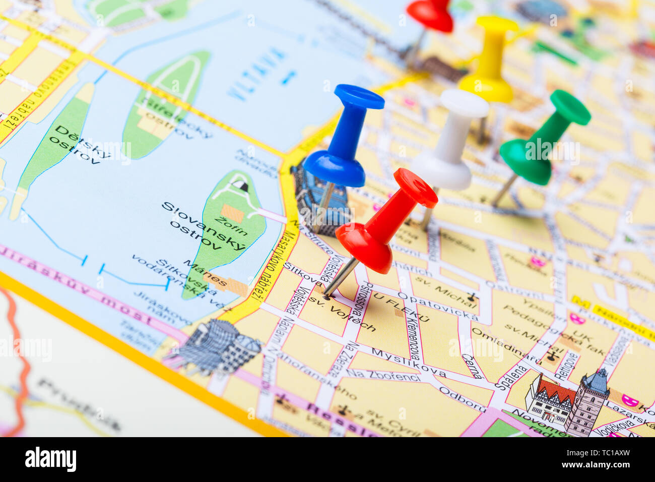 Travel destination points on a map indicated with colorful thumbtacks ...