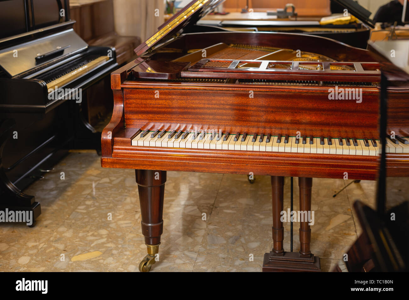 Rare classical musical instruments in a music store Stock Photo - Alamy
