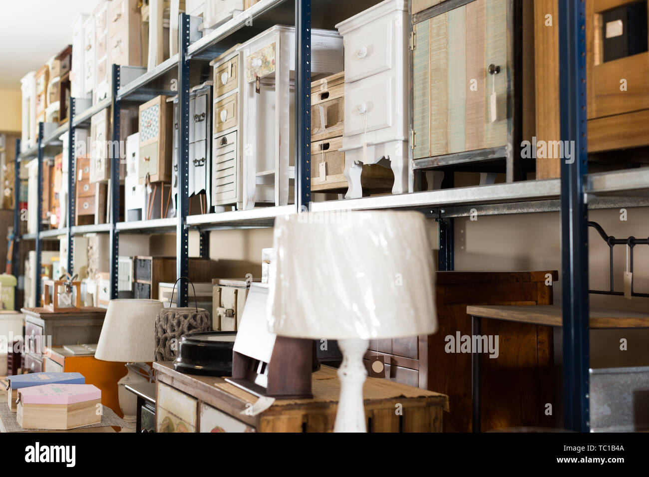 Wide range of vintage furniture and home design objects in showroom ...