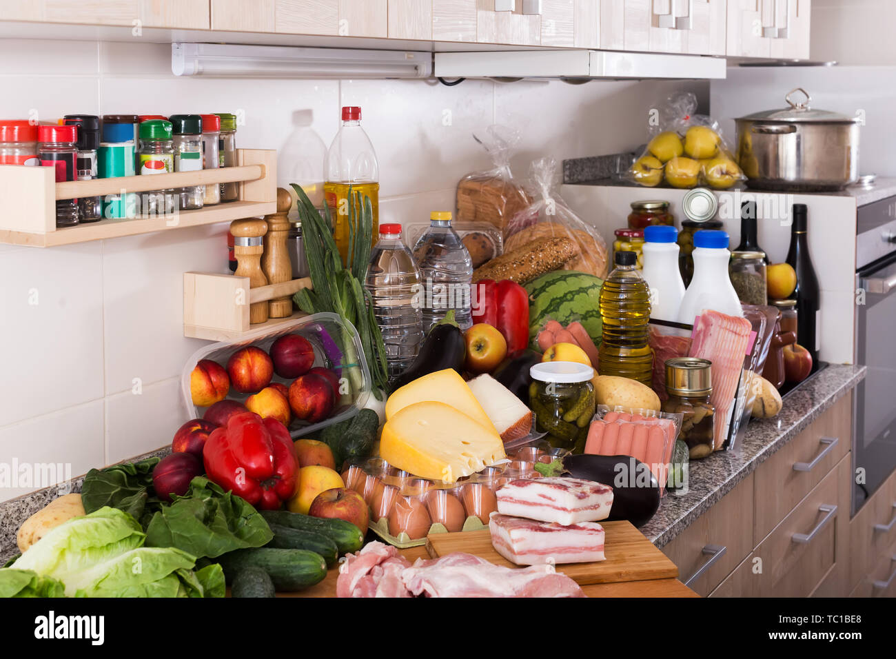Image of full table of different food in the kitchen at home Stock ...