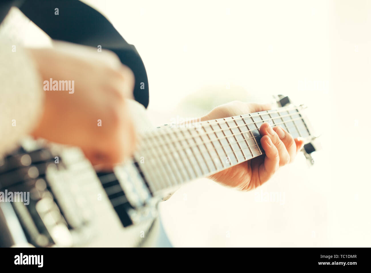 man playing electric guitar Stock Photo - Alamy