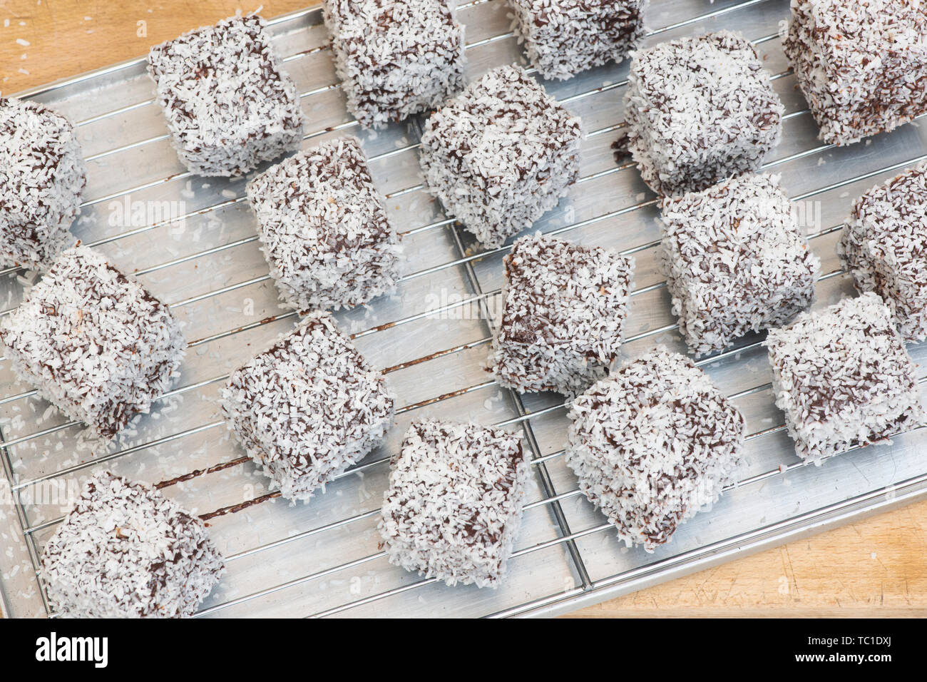 Homemade lamington cakes. Australian cake. Sponge cake cut into cubes ...